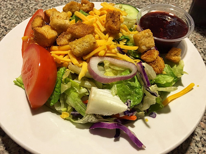 A garden-fresh salad that lets you pretend you're being virtuous, while those golden croutons whisper, "Who are you kidding? We're still friends with butter."