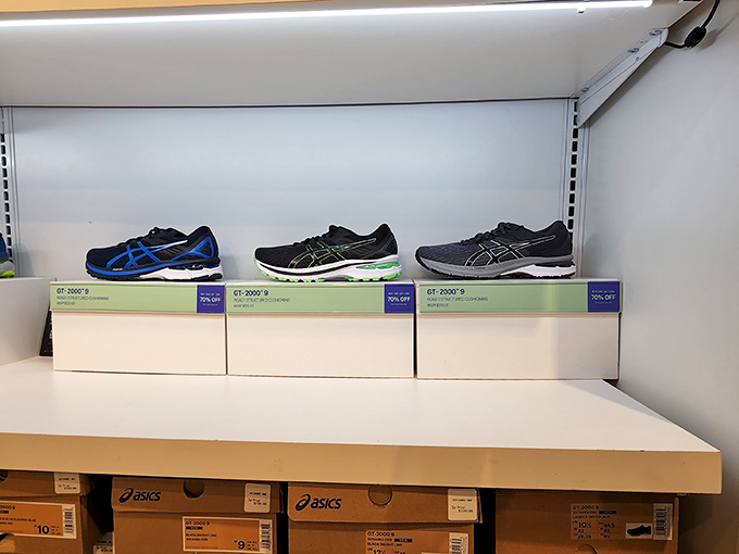 Running shoes lined up like soldiers ready for duty. Your wallet salutes their discounted price tags.