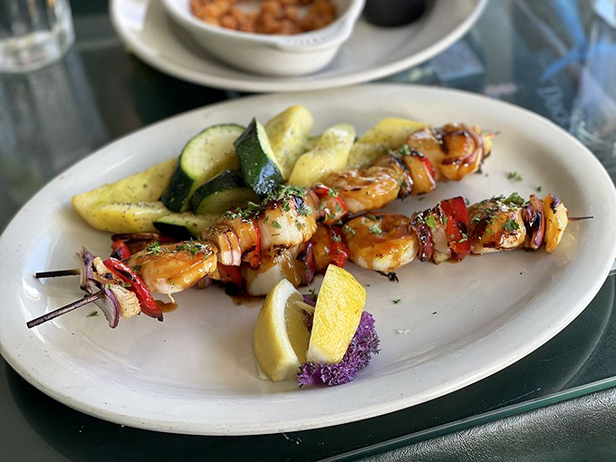 Skewers of perfectly grilled shrimp and vegetables that taste like summer itself. The chef clearly knows that simplicity is the ultimate sophistication.