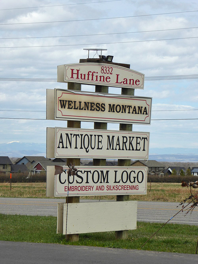 The roadside sign on Huffine Lane points the way to adventure. Montana's mountains provide the perfect backdrop for treasure hunting.