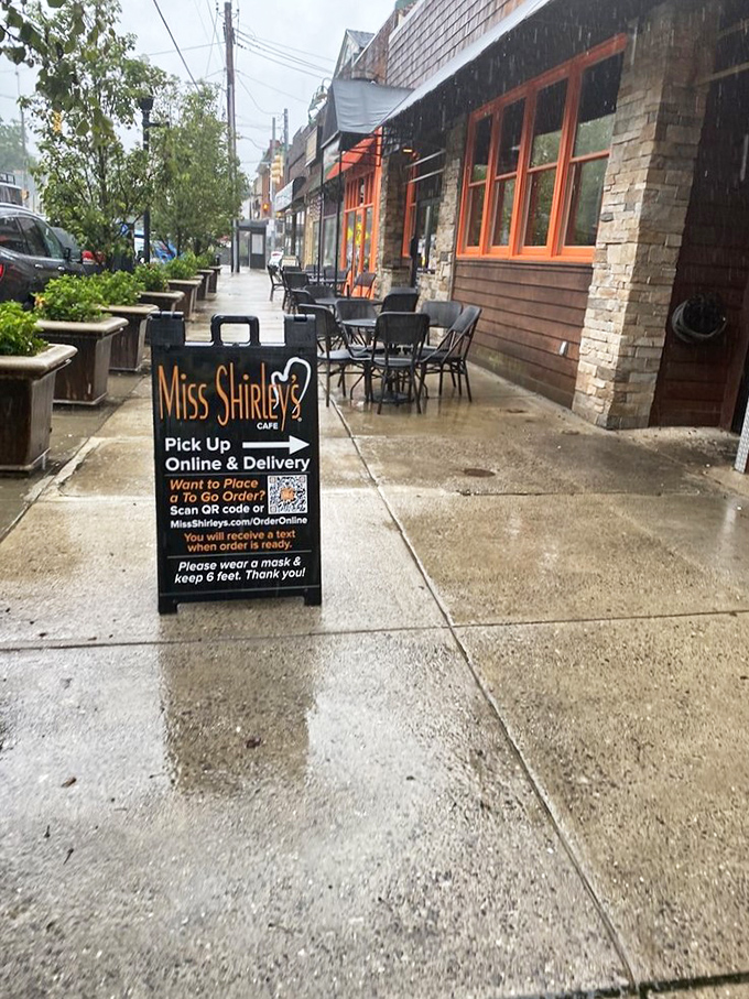 Even on rainy days, this sidewalk sign promises a ray of breakfast sunshine waiting just inside those doors.