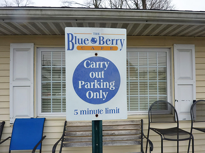 The "5 minute limit" carry-out sign suggests two things: their food is popular enough to need rules, and patience isn't their strongest virtue.