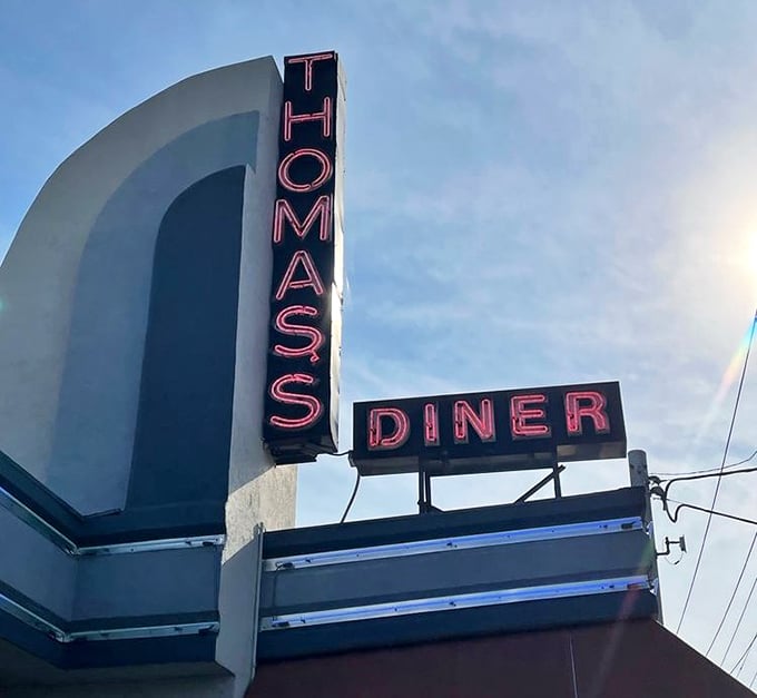 That glorious neon sign against the sky &ndash; like a retro bat signal calling hungry heroes to breakfast, no cape required.