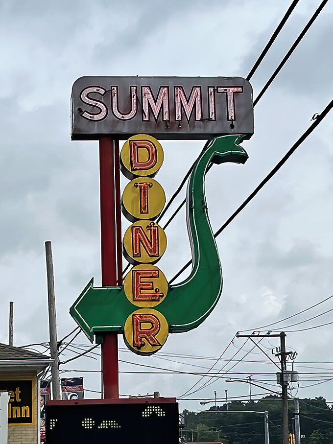 That neon sign doesn't just advertise a diner&mdash;it's a promise of consistency in an inconsistent world, glowing through rain, snow, and decades of American life.