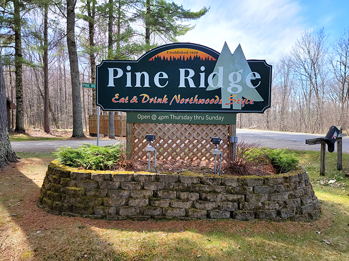 The roadside sign stands as a beacon to hungry travelers &ndash; "Eat & Drink Northwoods Style" isn't just a tagline, it's a delicious promise.