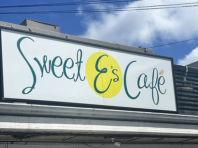 The cheerful sign promises sweetness, and the kitchen delivers&mdash;proving that sometimes you can judge a caf&eacute; by its cover after all.