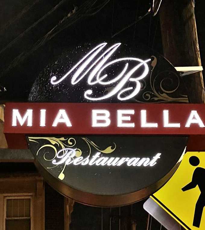 The glowing Mia Bella sign serves as a beacon for pasta pilgrims. Like the North Star, if the North Star led to exceptional Italian cuisine.