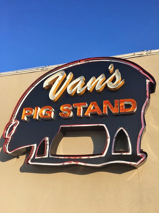 That neon pig sign doesn't just mark a restaurant&mdash;it's a beacon of hope for the hungry, a symbol of Oklahoma barbecue excellence.