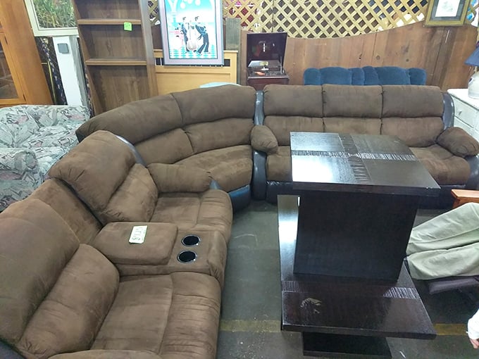 Sectional sofa situation! This brown microfiber ensemble awaits movie nights, naps, and conversations about how to get it home.