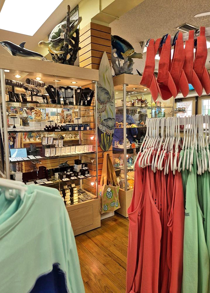 Lighthouse-themed retail therapy awaits! Because nothing says "I conquered 203 steps" like a coral-colored lighthouse Christmas ornament for Grandma.