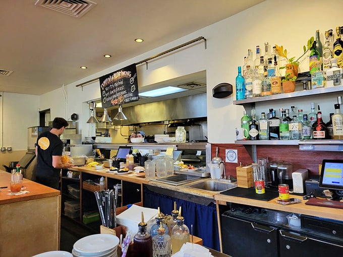 Where the magic happens &ndash; the open kitchen and well-stocked bar promise libations and creations that will make your taste buds dance the hula.