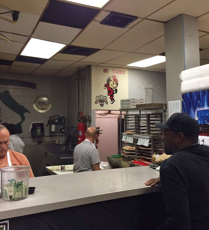 Behind the counter, where pizza magic happens. These aren't just cooks&mdash;they're memory-makers, crafting meals that become the backdrop for life's celebrations.