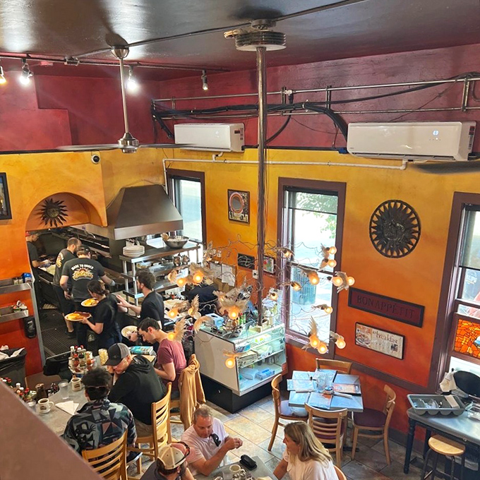 From above, the restaurant reveals its choreographed breakfast dance. A bird's-eye view of morning happiness in action.