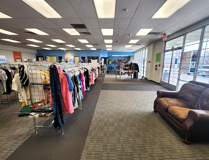 The wide-open spaces of thrift store possibility, where each aisle promises adventure and that leather couch has seen some stories.