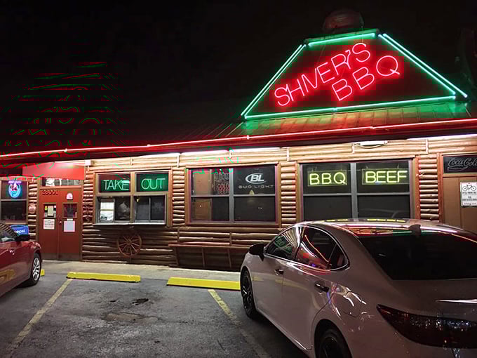 By night, Shiver's neon glow becomes even more enticing—like a barbecue bat signal calling to those with empty stomachs and full appreciation for tradition.