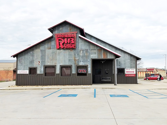 The metal exterior with its bold red sign stands as a beacon for hungry travelers&mdash;an unassuming landmark on the Mississippi barbecue trail.