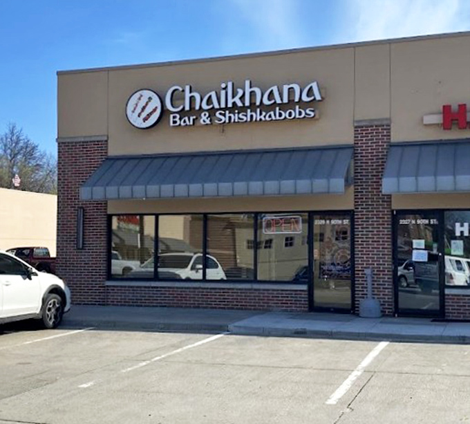 Morning light reveals Chaikhana's modest storefront—like finding a rare book with an unassuming cover but chapters full of culinary adventures inside.