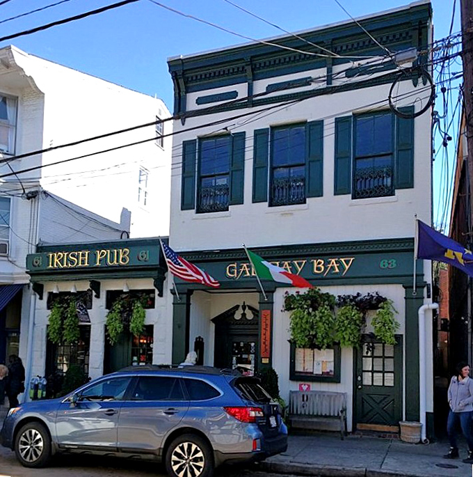 The classic storefront beckons like an old friend, promising authentic Irish warmth just beyond those welcoming green doors.