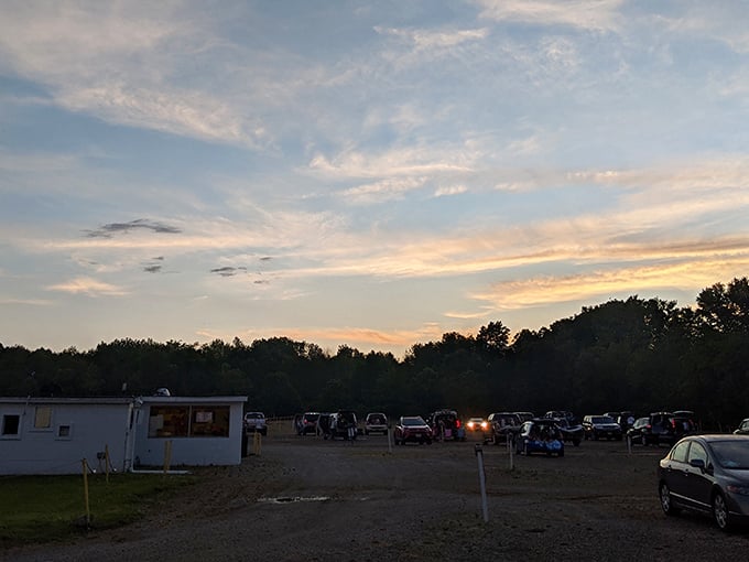 Nature provides the perfect backdrop as the sun sets behind the screen, painting the sky in colors no CGI could ever match.