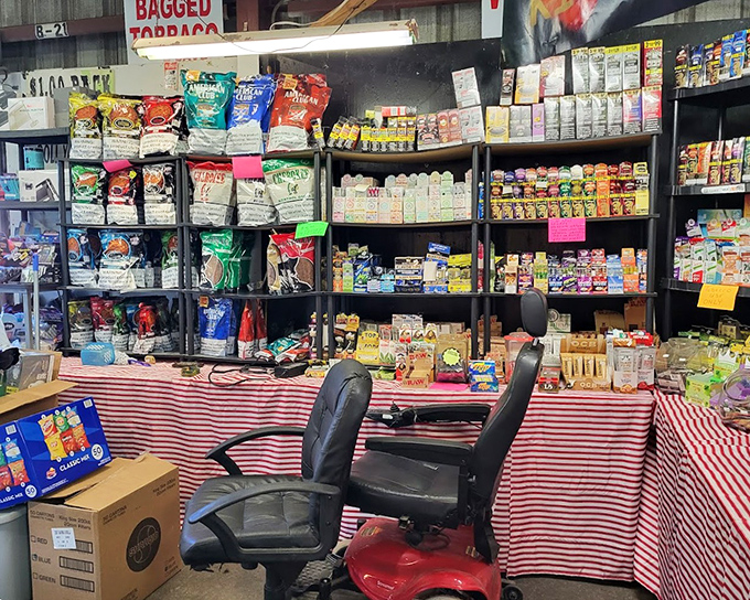 Corner store nostalgia meets flea market entrepreneurship. The red-checkered tablecloth adds that perfect touch of homespun commerce.