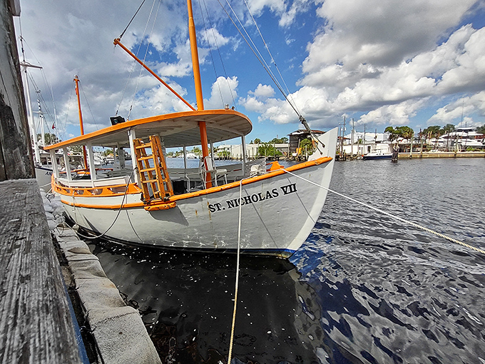 The St. Nicholas VII sponge boat rests between adventures, a floating piece of Greek heritage docked in Florida waters.