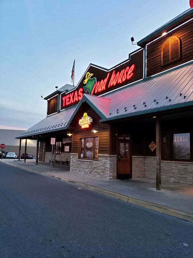 Texas Roadhouse glows invitingly at dusk, promising hearty meals when you're not in the mood to cook. Because retirement means never having to say, "We have food at home."