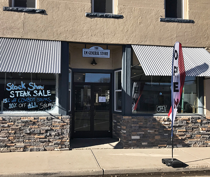 The L.M. General Store advertises steak specials with small-town directness—no fancy marketing needed when the product speaks for itself.