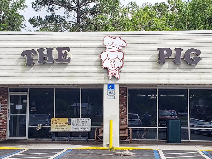 The Pig Bar-B-Q's whimsical sign promises pork perfection. When a restaurant puts a chef's hat on its mascot, they're serious about their smoking skills.