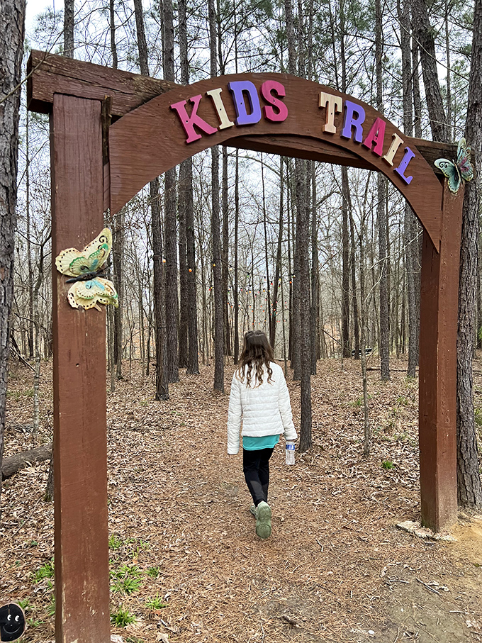 The Kids Trail entrance promises adventures scaled perfectly for little explorers who need nature time without the epic distances.