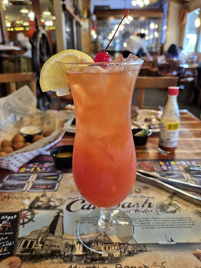 A sunset in a glass – this tropical cocktail promises vacation vibes with every sip, regardless of how many crab legs you've already conquered.