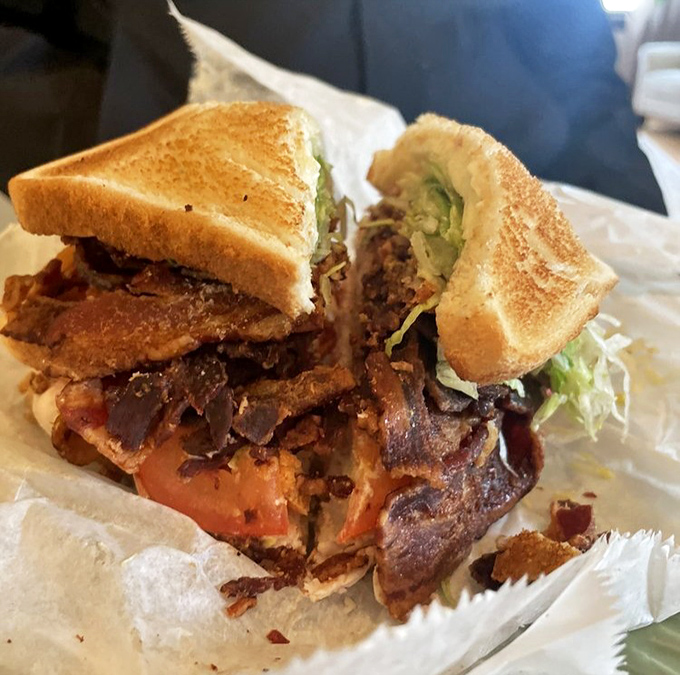 A sandwich so packed with bacon it should come with a cardiologist's business card. Worth every delicious, life-shortening bite.