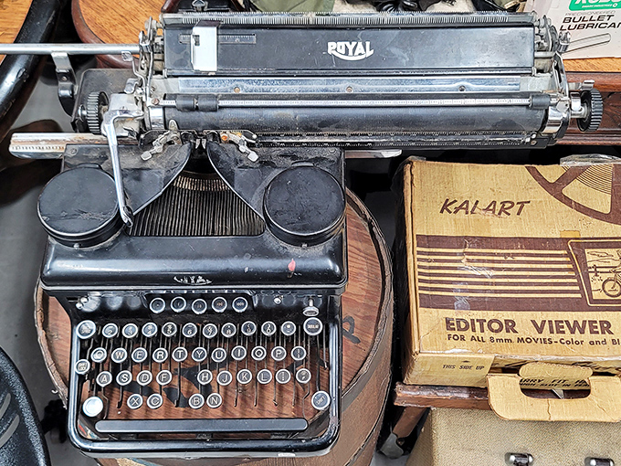That Royal typewriter once clacked out someone's great Alaskan adventure; now it awaits yours, with vintage bottles standing by for inspiration.