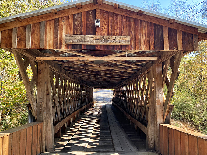 The bridge's entrance frames the path ahead like a portal to the past&mdash;each wooden beam telling stories of travelers from another era.