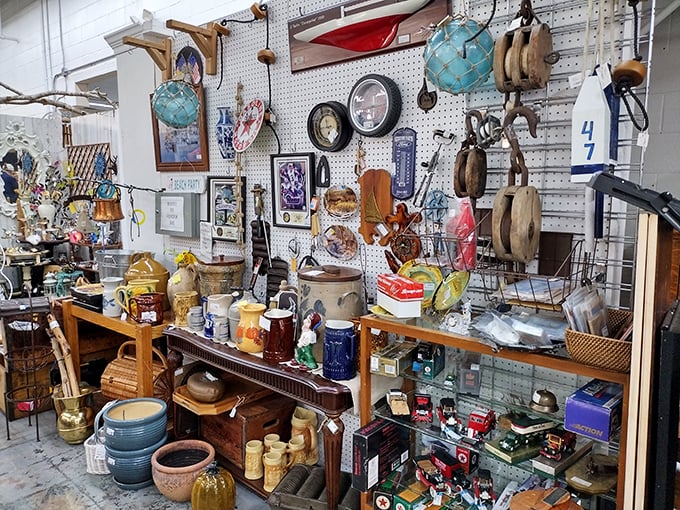 Nautical treasures and everyday artifacts coexist in organized chaos. Someone's fishing trip memento becomes your coastal-themed bathroom accent.