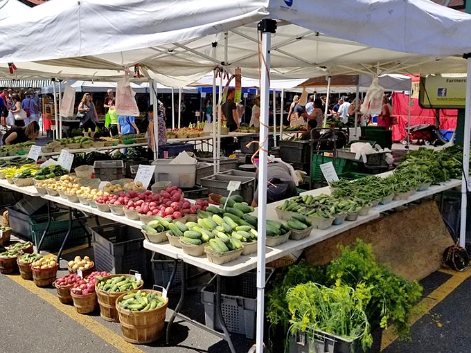The ultimate farmers market tetris challenge: fitting all these gorgeous vegetables into your reusable bags without crushing a single leaf.