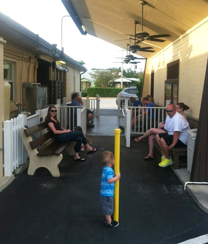 The waiting area isn't just a place to kill time – it's where anticipation builds and strangers become temporary friends united by imminent seafood joy.
