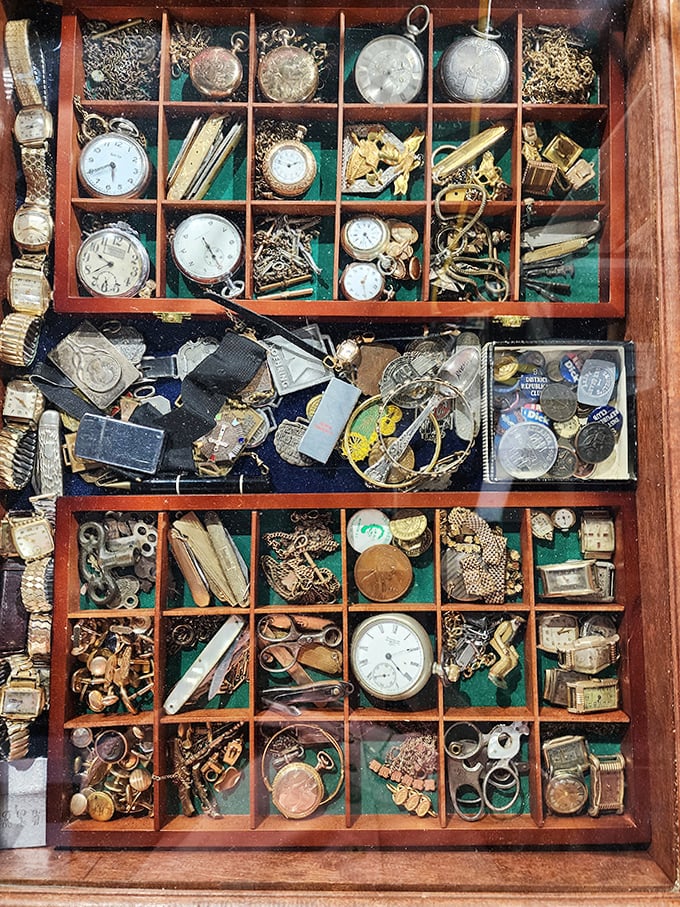 A watchmaker's dream or nightmare—hundreds of tiny treasures organized in wooden compartments. Time, literally in pieces.