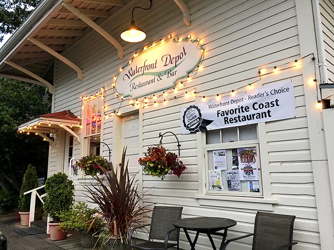 The Waterfront Depot Restaurant glows with invitation at dusk, promising seafood so fresh it was practically swimming that morning. 