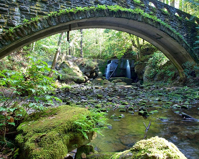 Whatcom Falls Park's stone bridge frames cascading water in a scene so picturesque it feels like Mother Nature is showing off.