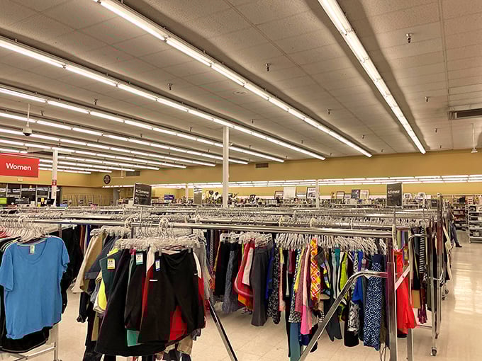 The women's clothing section stretches as far as the eye can see. Each rack represents a different fashion era waiting to be rediscovered.