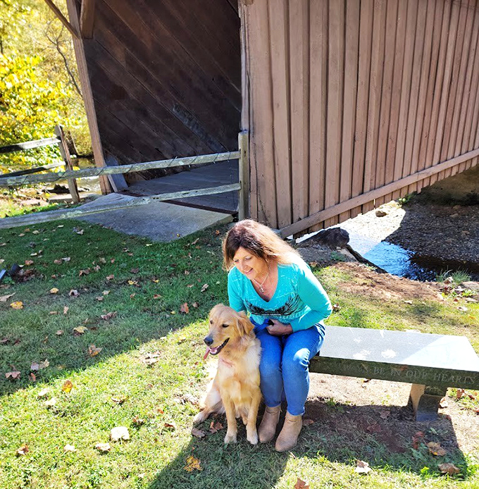 This golden retriever seems to understand the appeal of the bridge better than most humans—sometimes the best attractions are the ones that have stood the test of time.