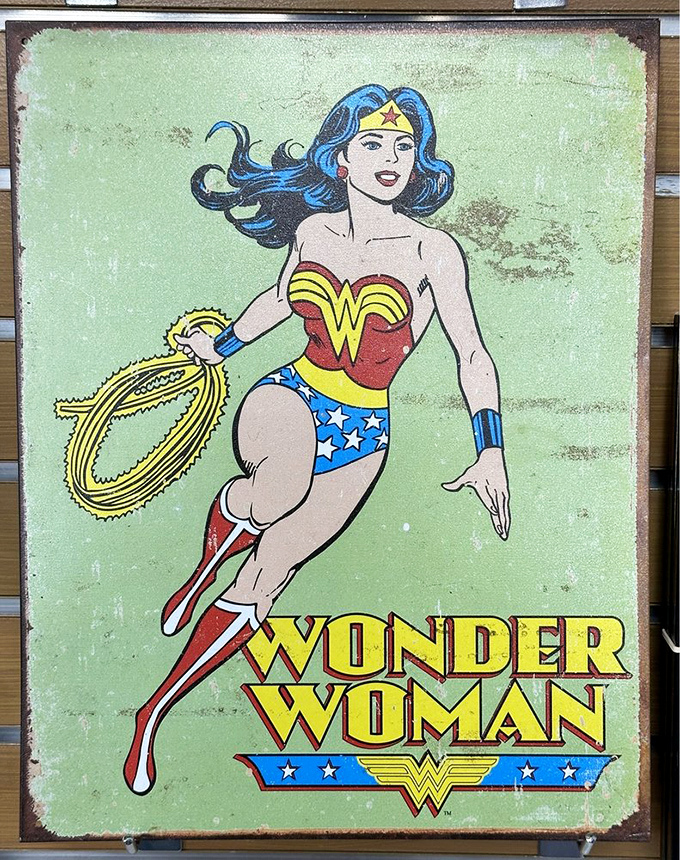 Wonder Woman watches over the home d&eacute;cor section, reminding shoppers that finding vintage treasures at these prices is indeed a superpower.