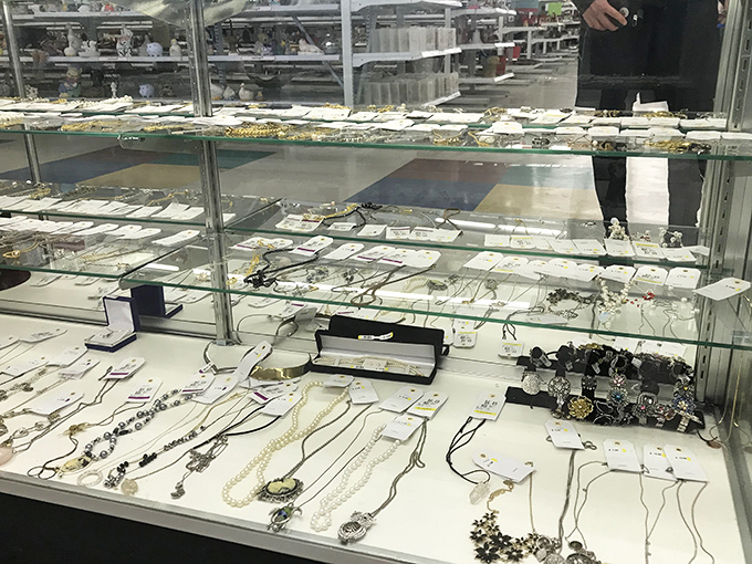 The jewelry counter gleams with potential statement pieces. Behind that glass lies someone's future "My grandmother gave me this" white lie at a cocktail party.