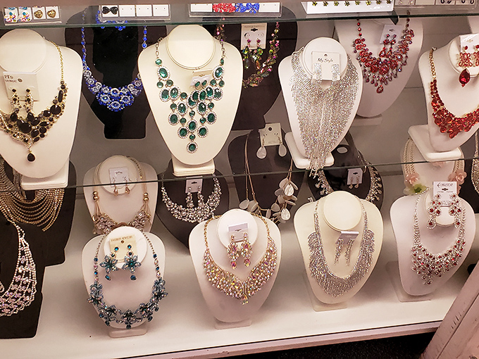 Jewelry display that transforms "costume" into "statement." These necklaces don't whisper—they announce your arrival like a bedazzled town crier.