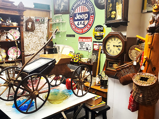 An antique carriage wheel spins tales of prairie travel alongside vintage Jeep memorabilia and grandfather clocks.