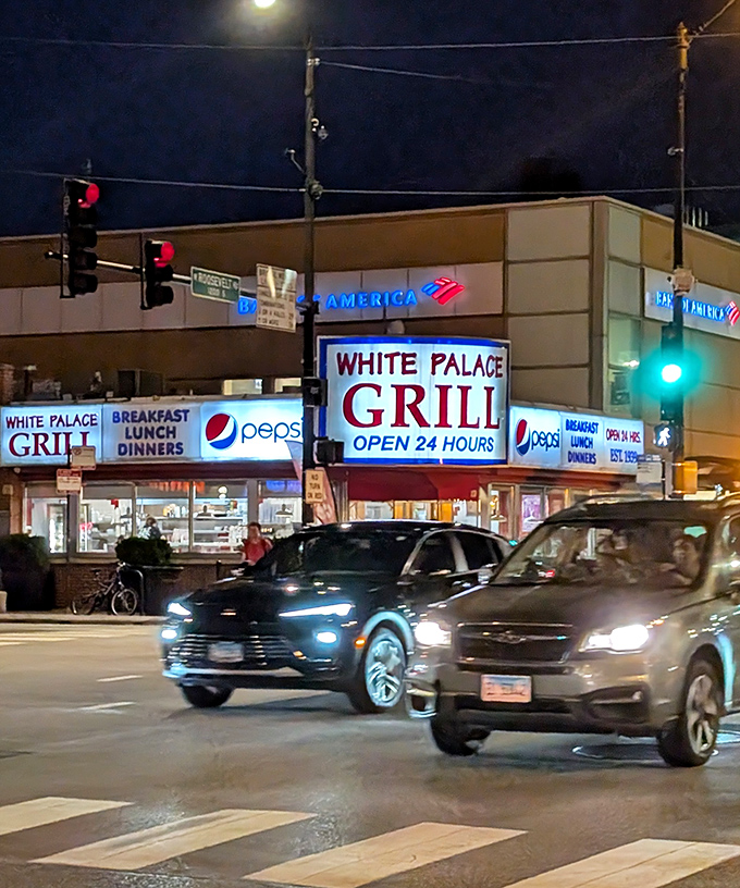 At night, the White Palace Grill's neon glow acts as a lighthouse for the hungry, the sleepless, and those whose evening plans didn't quite go as expected.