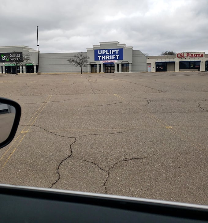 From the parking lot, Uplift Thrift's prominent signage promises a day of discovery between its neighboring businesses.