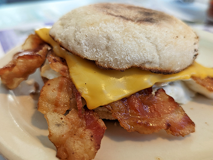The breakfast sandwich that launched a thousand workdays&mdash;crispy bacon peeking out like it's playing hide-and-seek with that perfectly melted American cheese. 