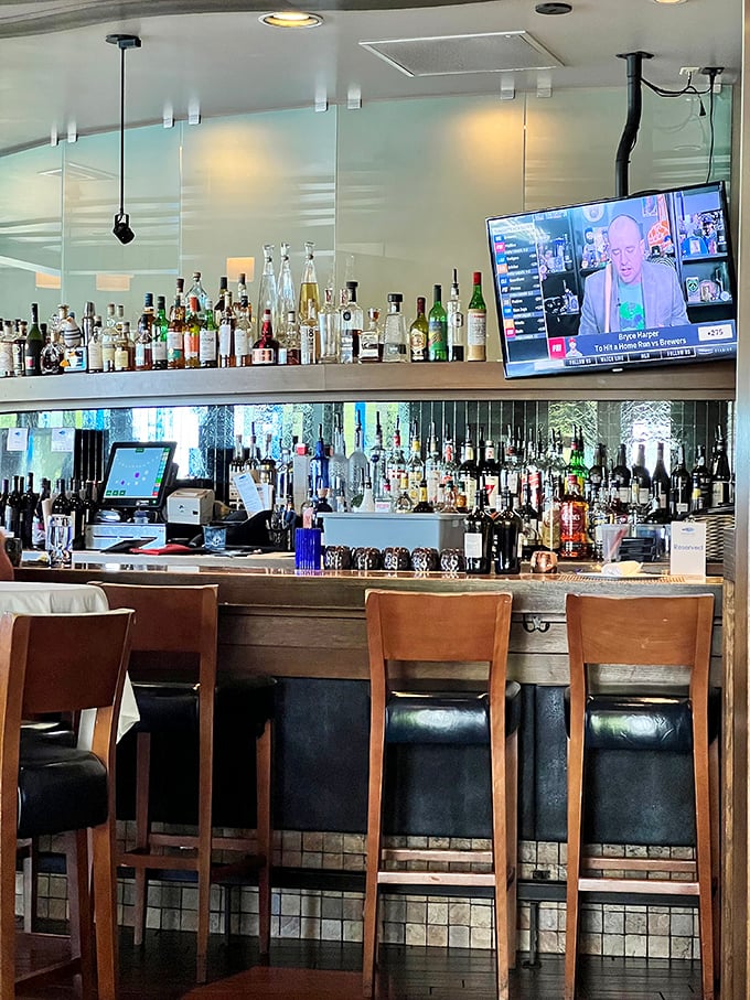 The well-stocked bar promises creative cocktails to complement your seafood feast. Those blue glasses are calling my name.