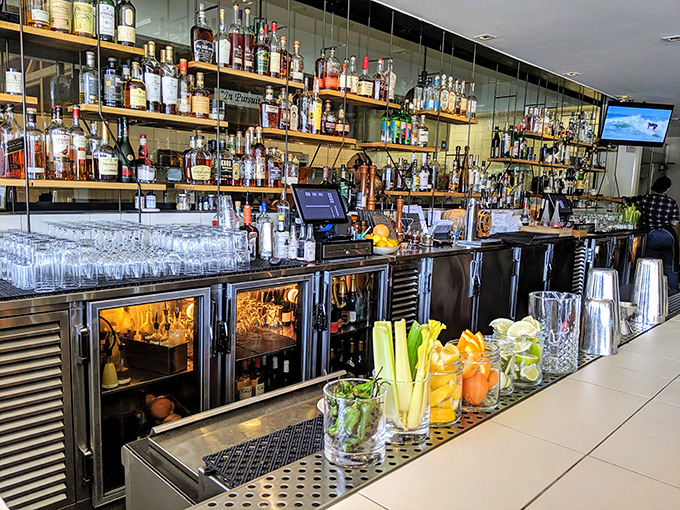 The bar at Charcoal Venice isn't just stocked&mdash;it's armed for any cocktail emergency. Those fresh garnishes stand ready like flavor soldiers.